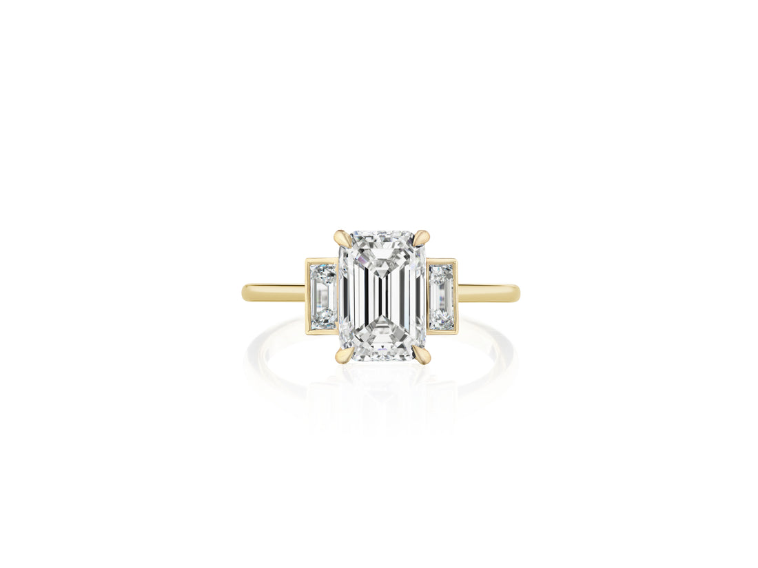 Emerald Cut Diamond Engagement Ring with Bezel Set Baguette Side Stone