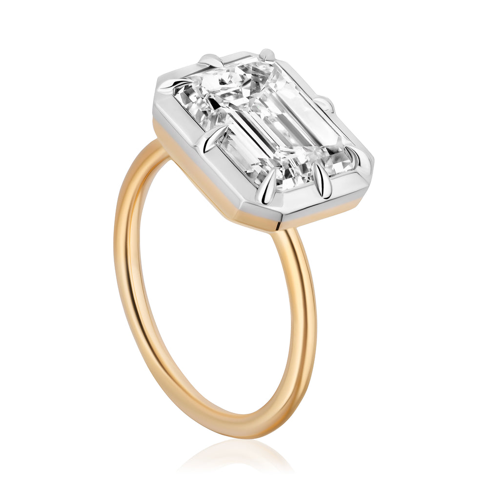 East-West Collet Setting Emerald Cut Diamond Engagement Ring